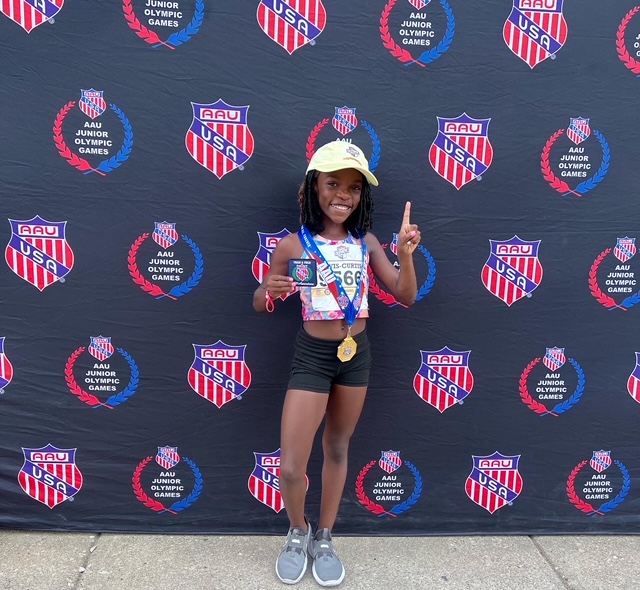 Oak Park girl leaps to Junior Olympic championship - Wednesday Journal