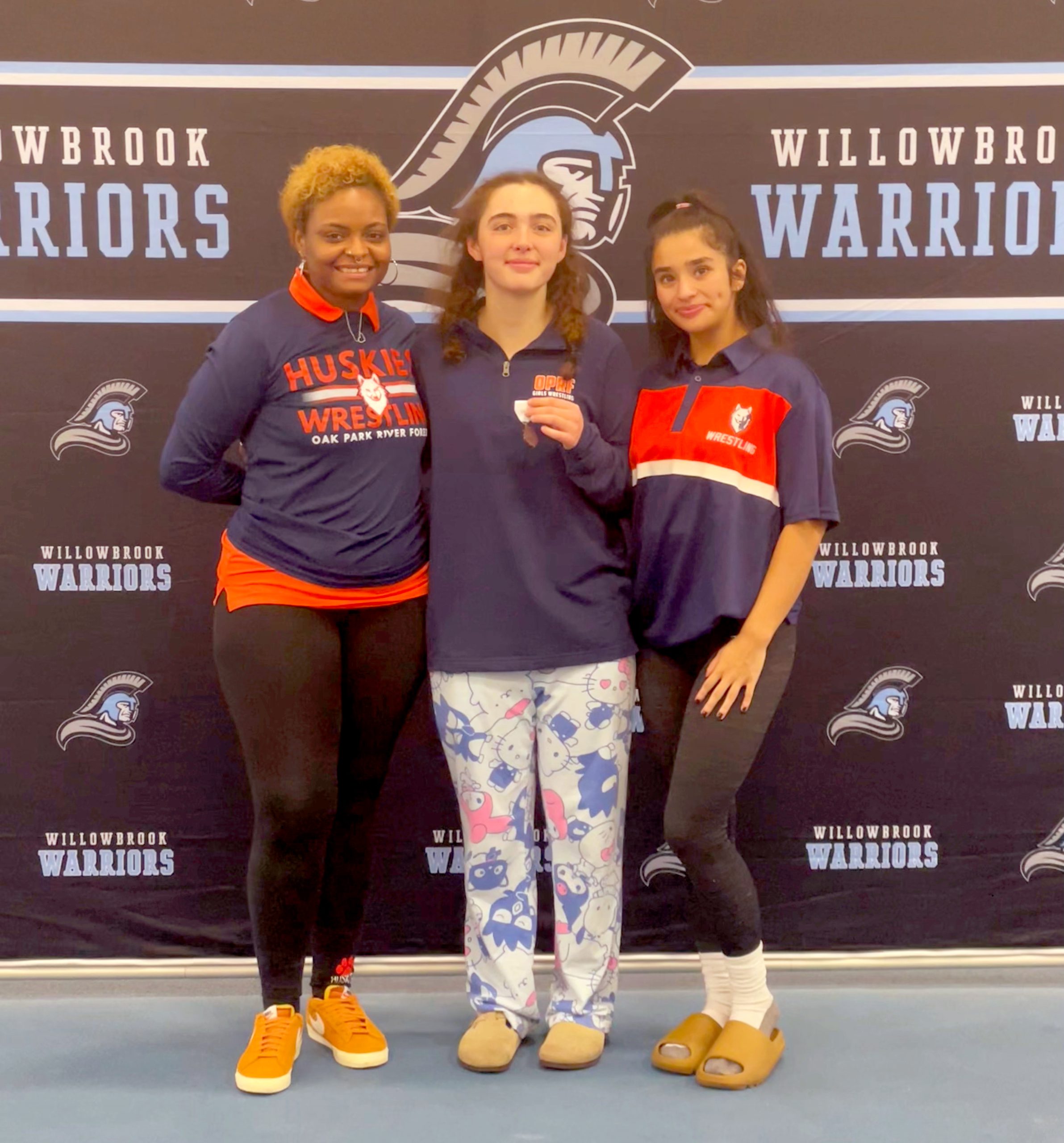 OPRF’s Miller advances to girls wrestling sectional - Wednesday Journal